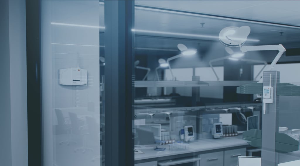View of a kitchen with the control unit in the foreground. The image ...